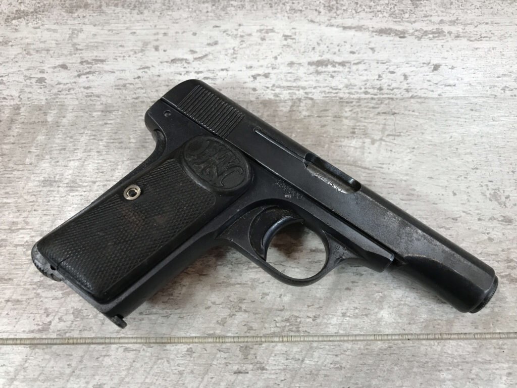 FN M1910 PISTOL WITH HOLSTER AND SPARE MAG #022 - Checkpoint Charlie's